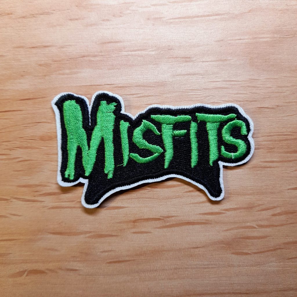 Misfits (green text) – Iron-on patch – Rainbow Badges